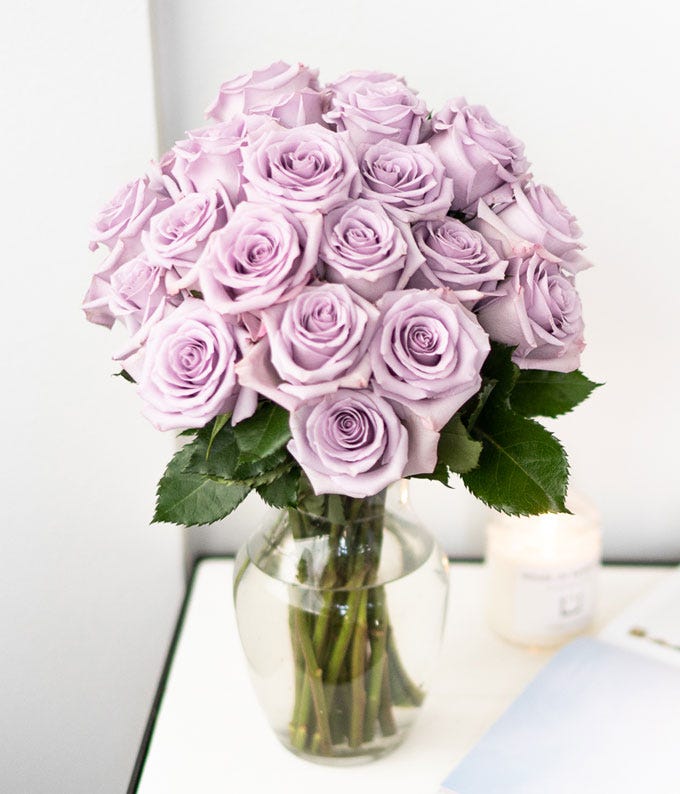 Two Dozen Long Stem Purple Roses in a Clear Glass Vase at From You Flowers